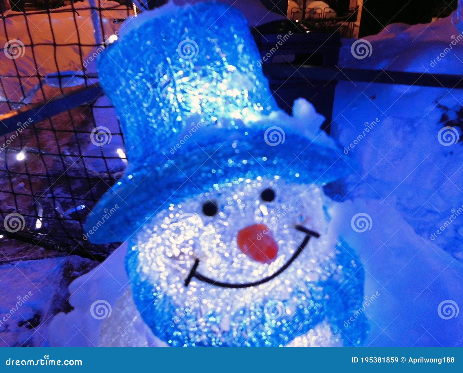Snowman in blue lighting stock image. Image of xmas - 195381859