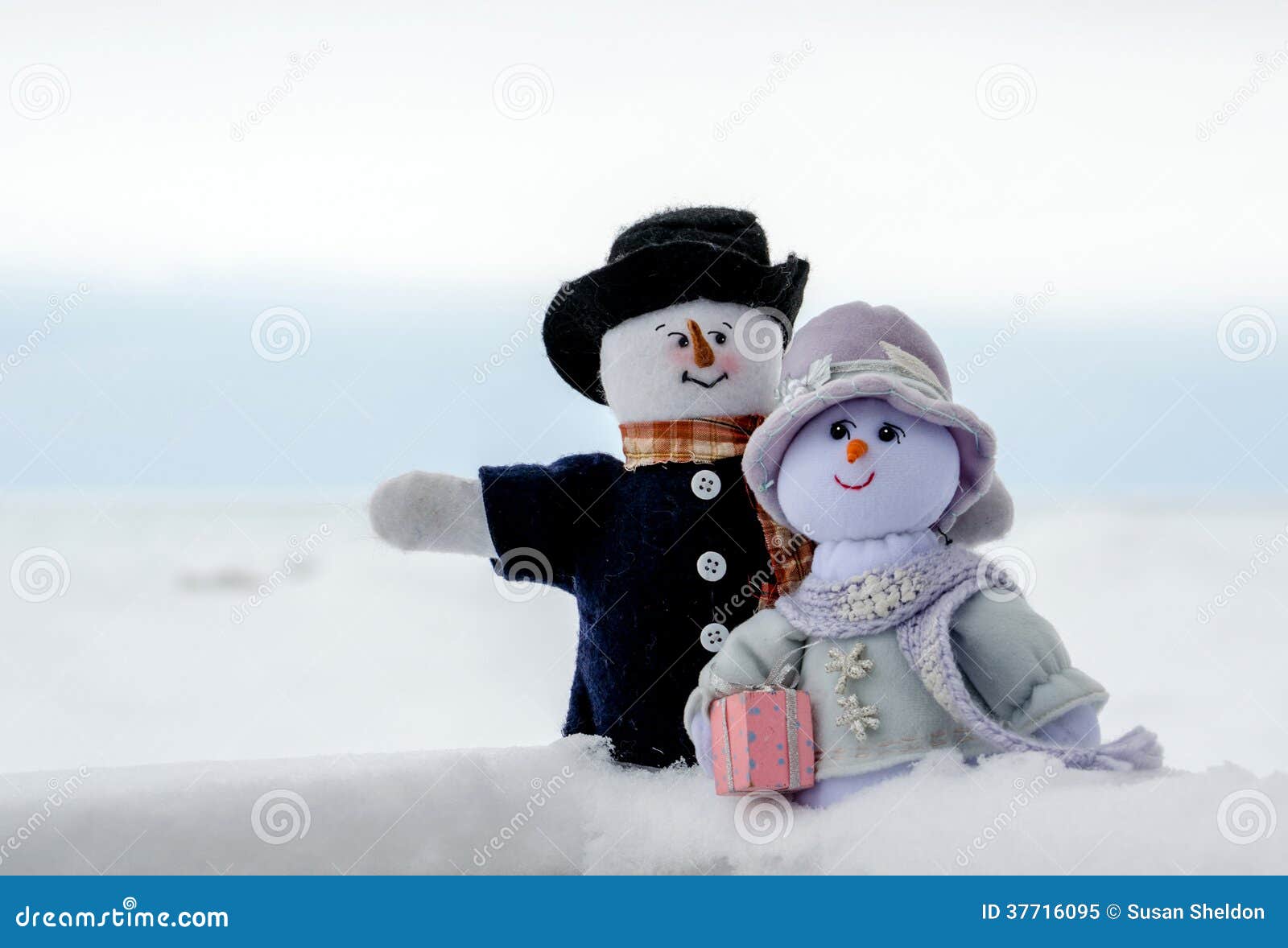 Snowman Couple Pose in the Snow Stock Image - Image of america ...