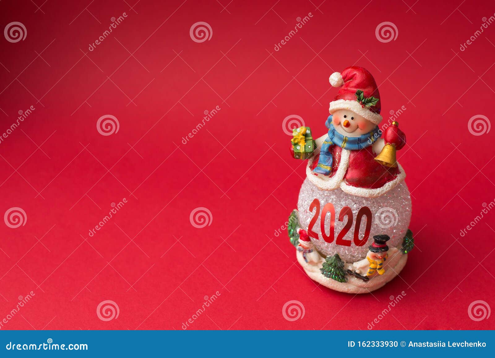 Snowman Isolated on Red Background. Snowman with Scarf and Red Cap 2020 ...