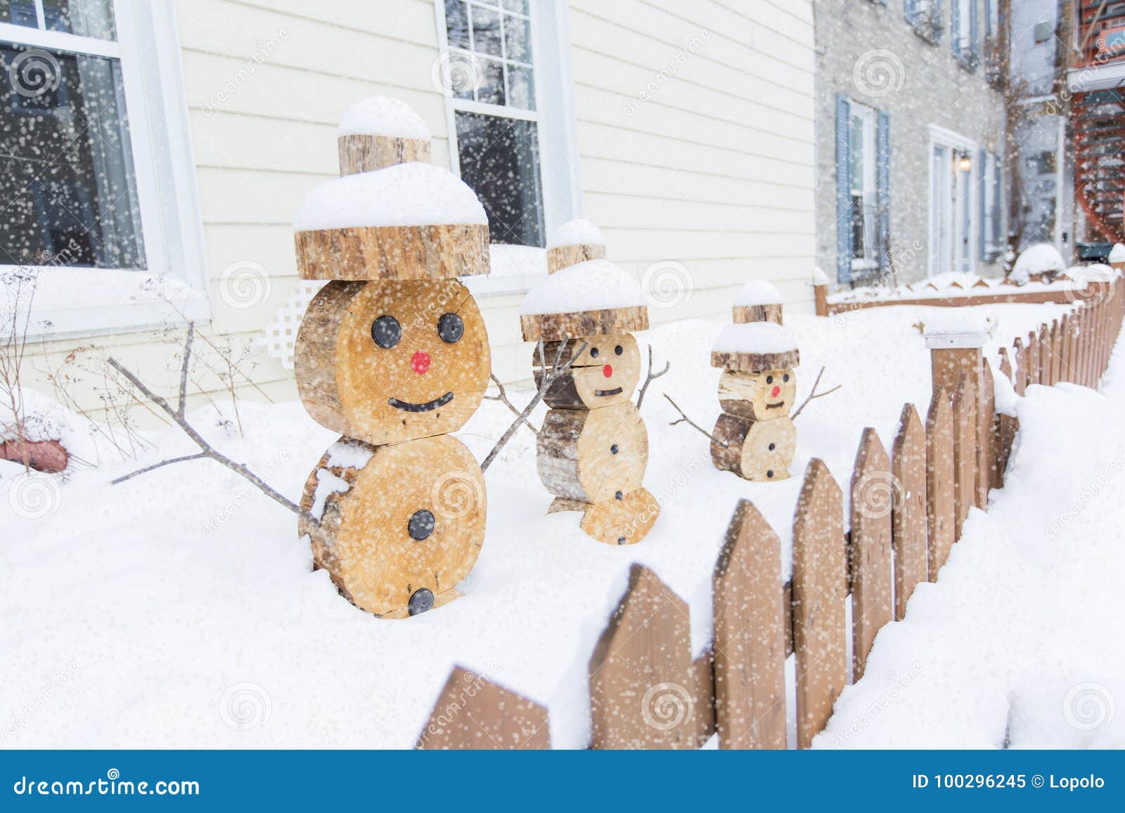 Snowman Made in Piece of Wood with Fence on the Front Stock Image ...