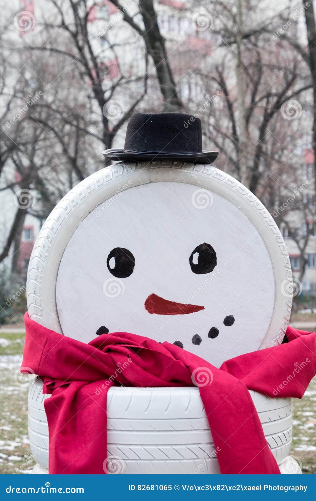 Snowman made by tire car. stock image. Image of white - 82681065