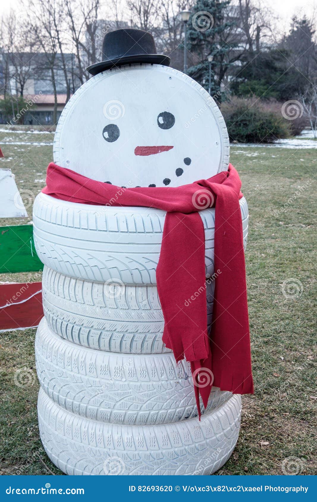 Snowman made by tire car. stock photo. Image of vacations - 82693620