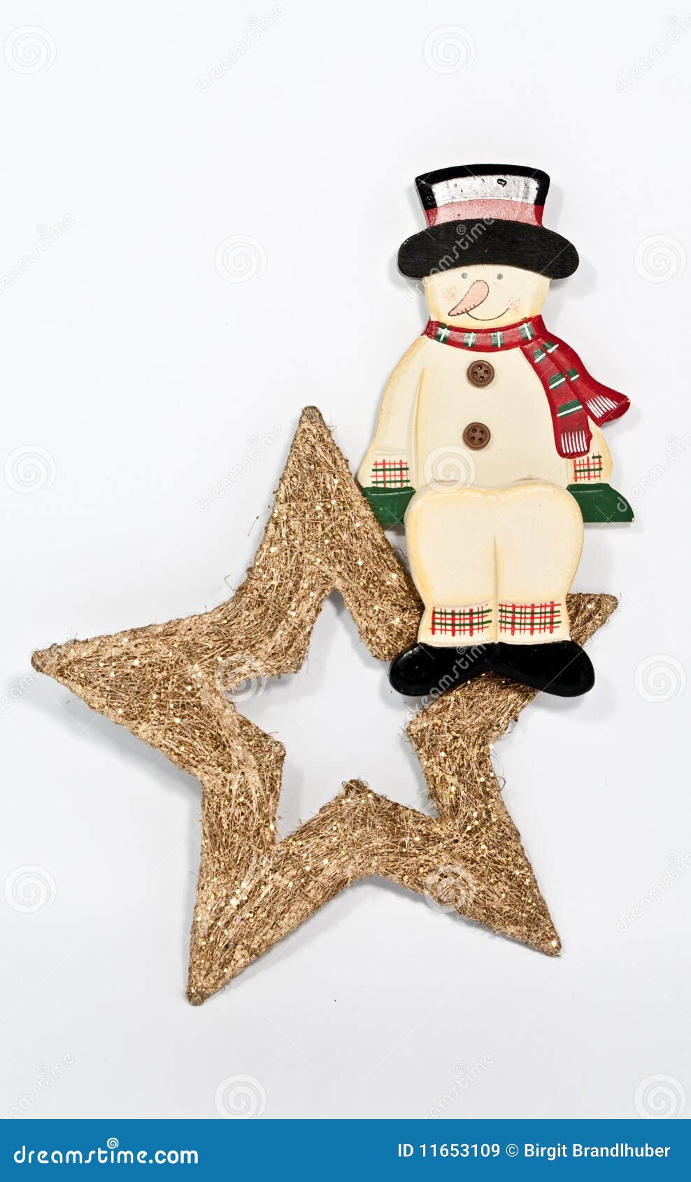 Snowman sitting on a star stock image. Image of snow - 11653109