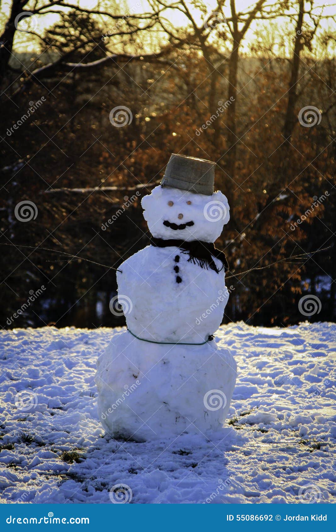 Snowman at sunrise stock photo. Image of snowman, white - 55086692