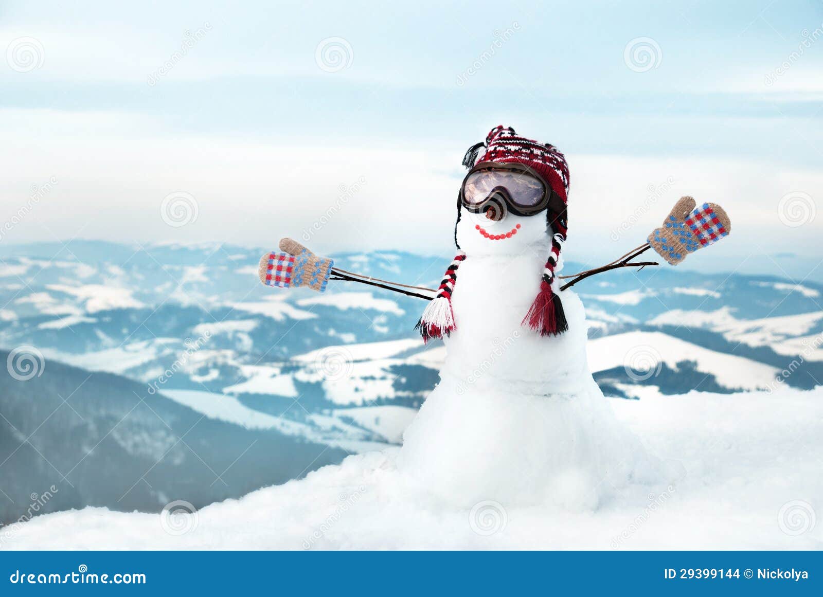Snowmen at the mountains stock photo. Image of present - 29399144