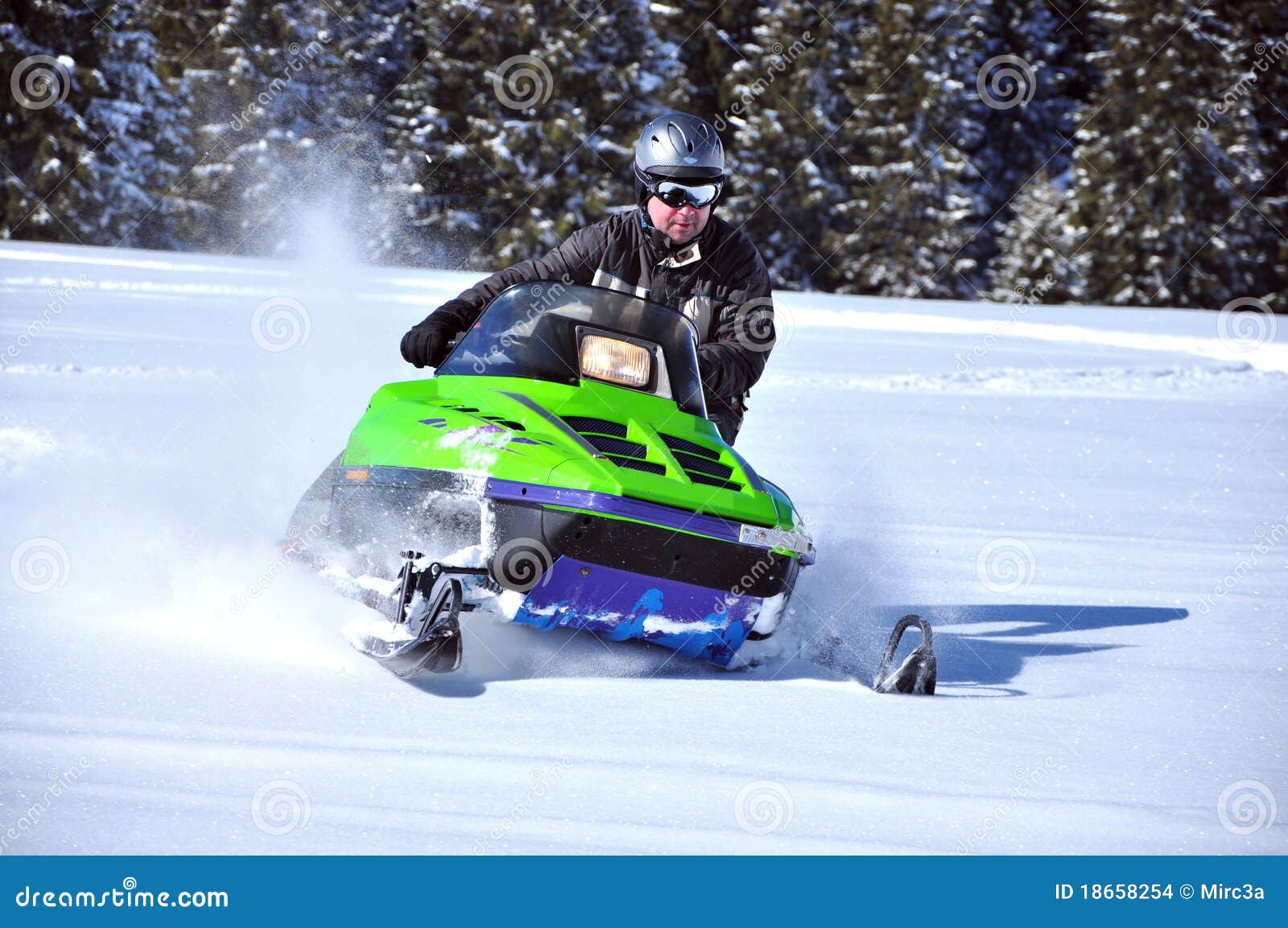 Snowmobile in action stock photo. Image of lakes, speed - 18658254