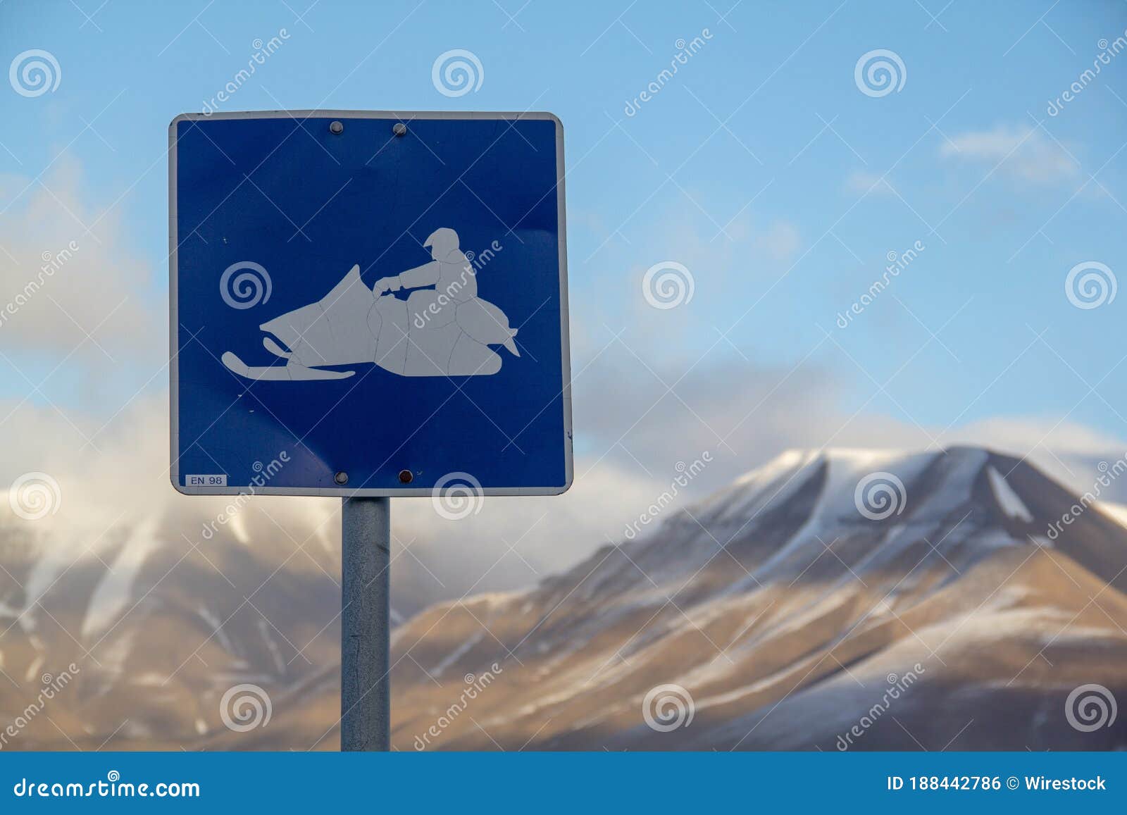 Snowmobile Blue Road Sign in the Mountains Stock Photo - Image of ...