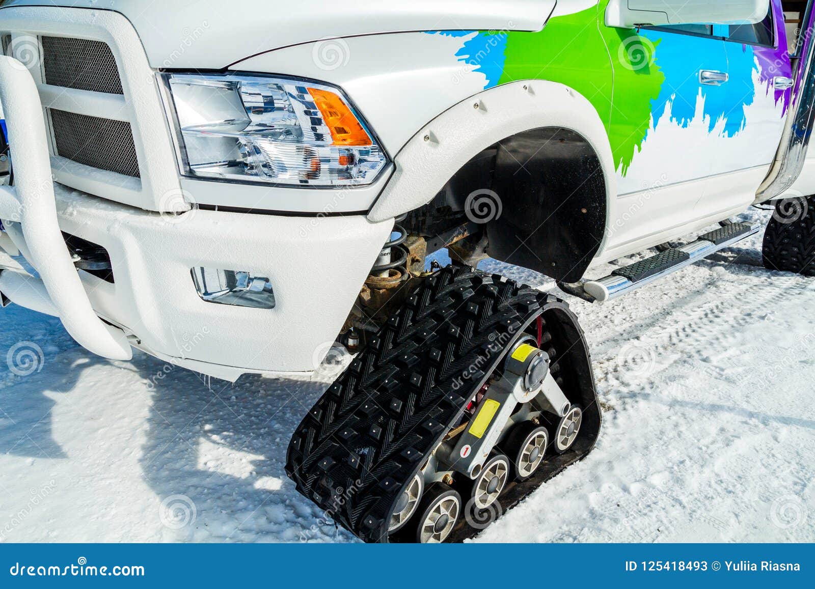 Snowmobile With Caterpillars Of Triangular Shape. A Closeup Of A ...