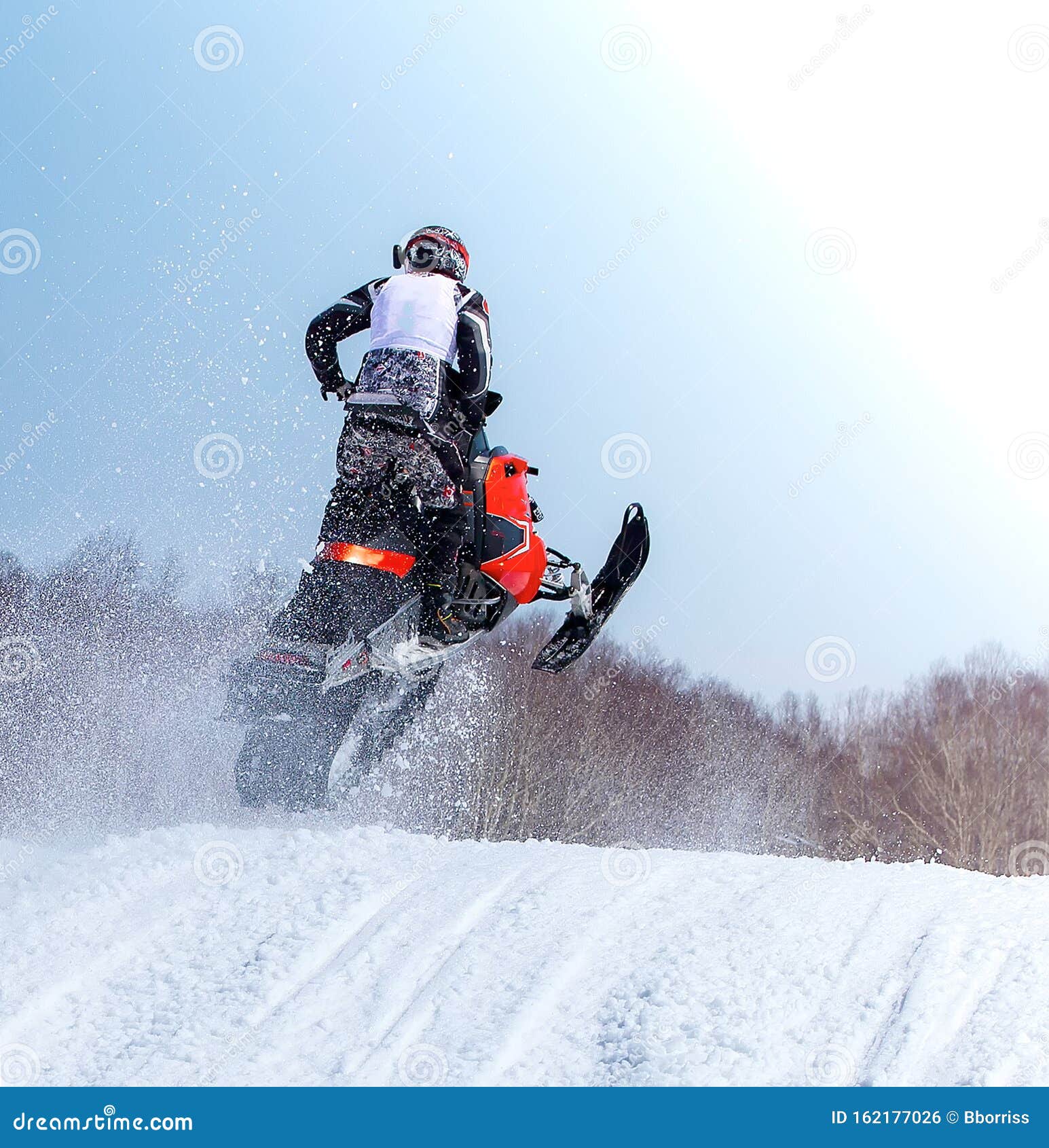 Snowmobile in High Jump Above Track Stock Photo - Image of machine ...