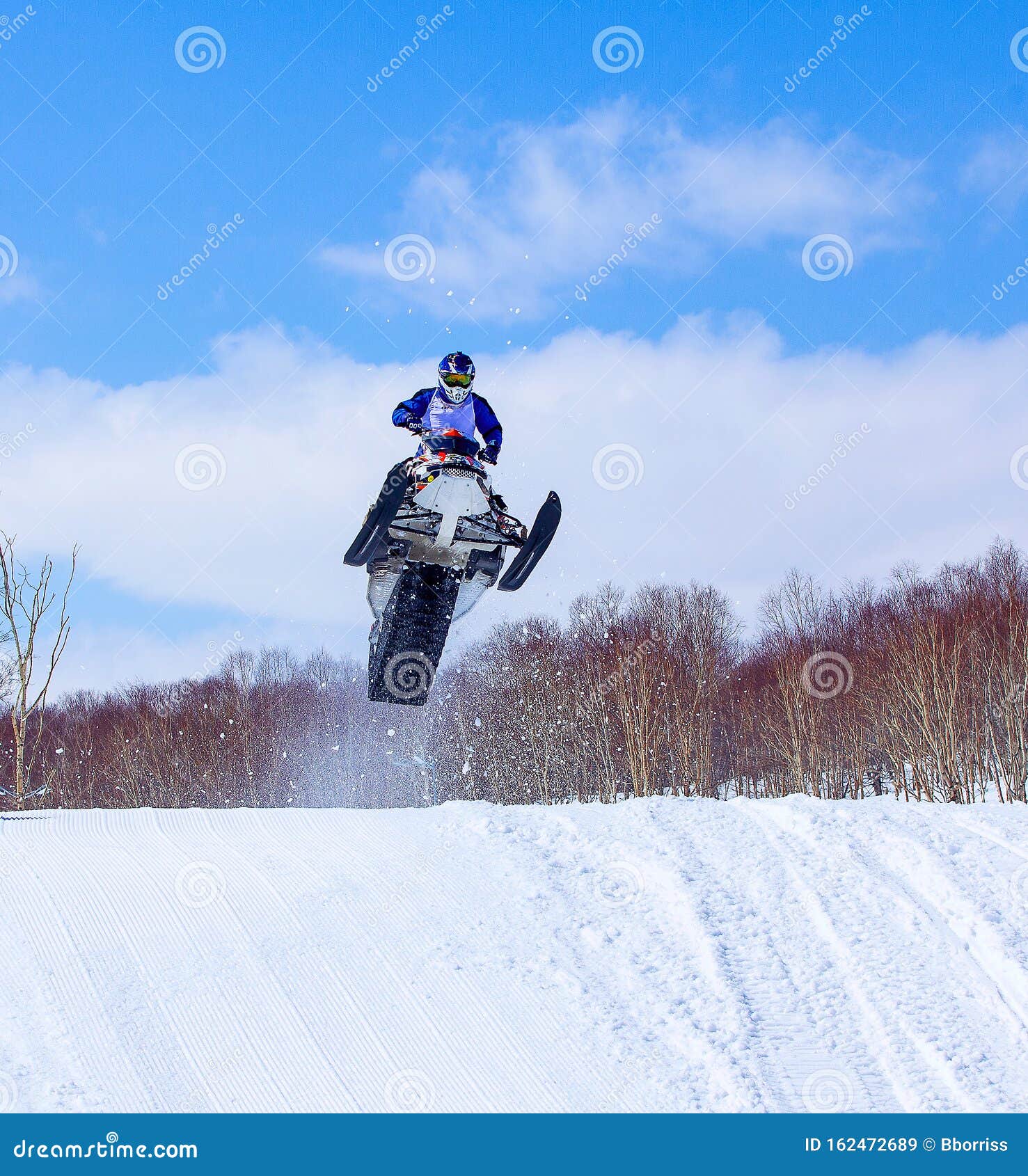Snowmobile in High Jump Above Track Stock Image - Image of leisure ...