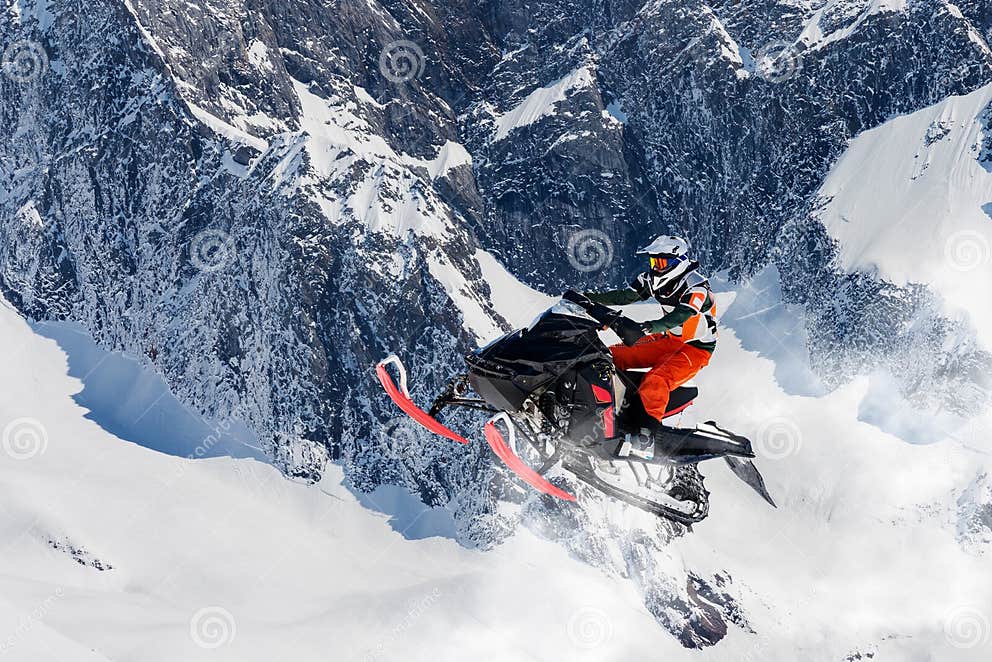 Snowmobile jump stock photo. Image of races, motorized - 185790588