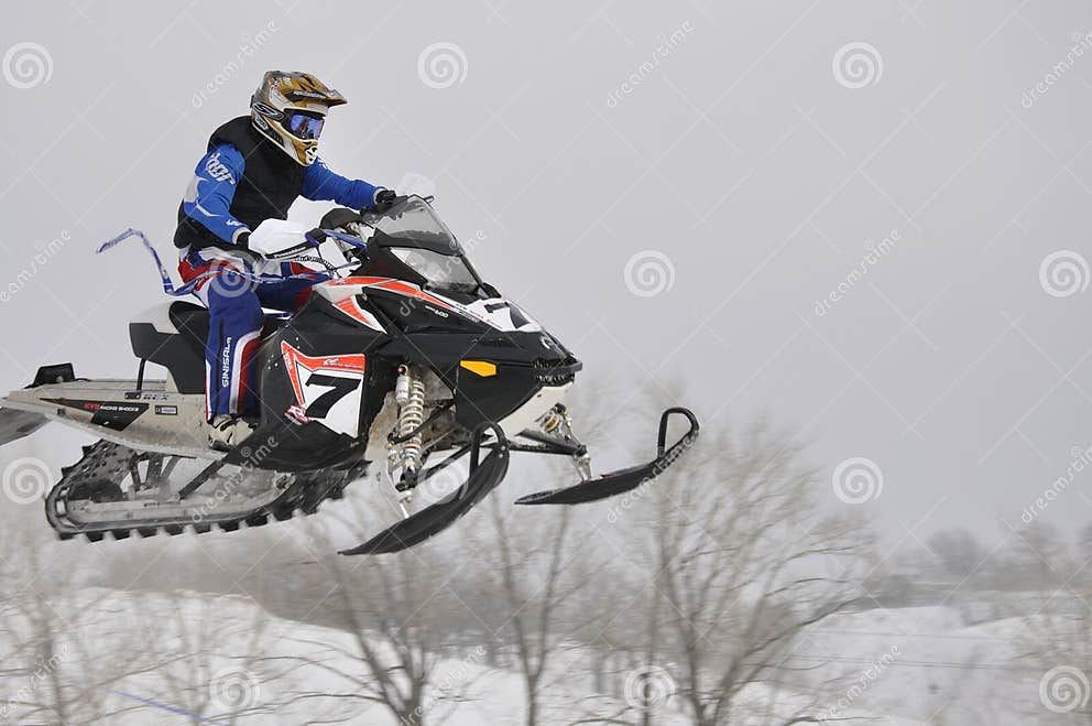 Snowmobile Racer Flying Down the Mountain Editorial Image - Image of ...