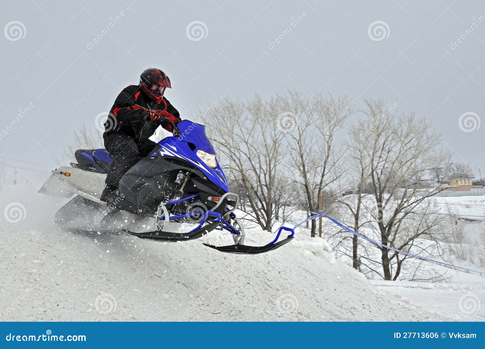 On the Snowmobile Rider Jumps Down the Mountain Stock Photo - Image of ...
