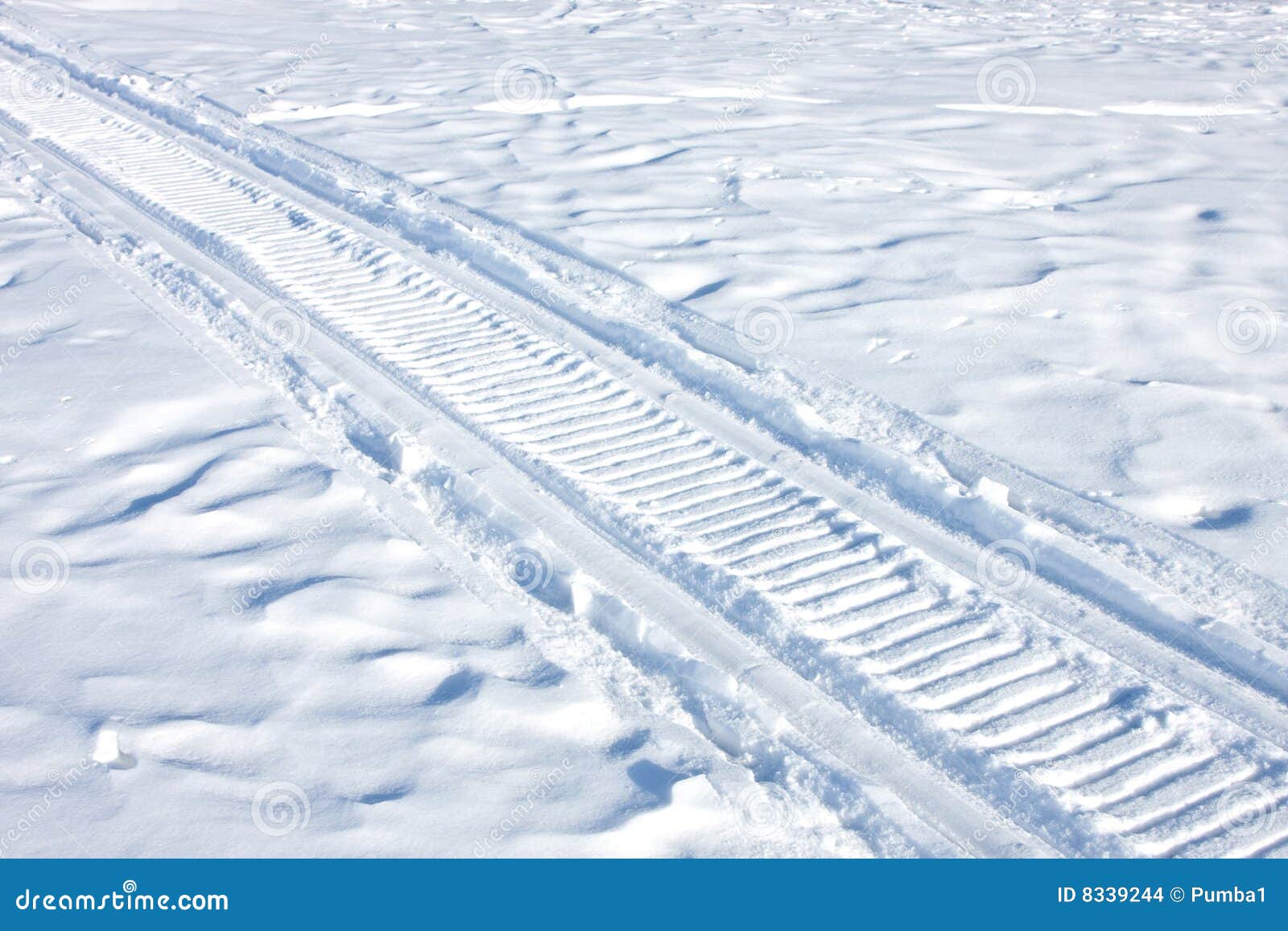 Snowmobile traces on snow. stock photo. Image of clear - 8339244
