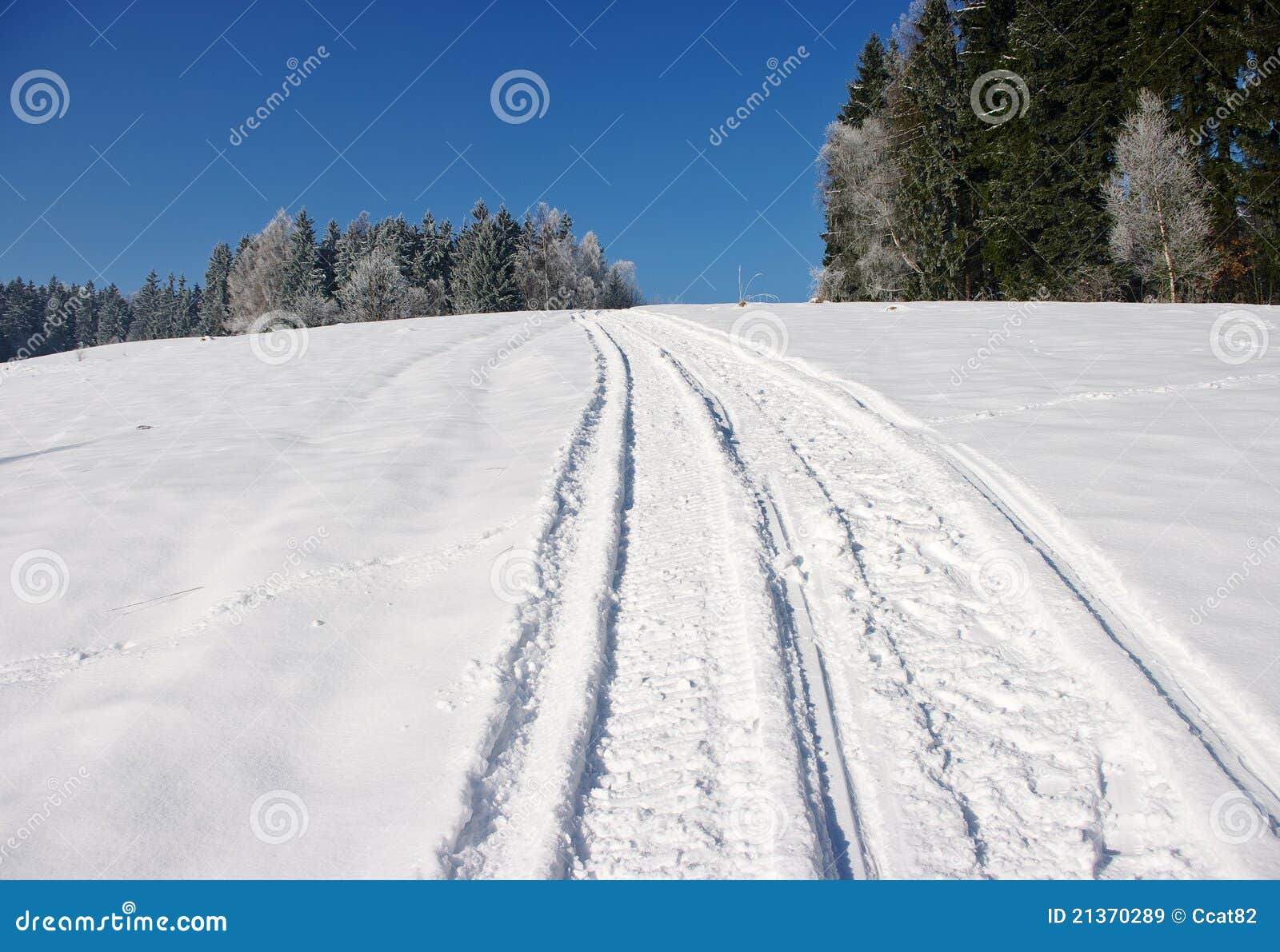 Snowmobile track stock image. Image of path, snowbound - 21370289