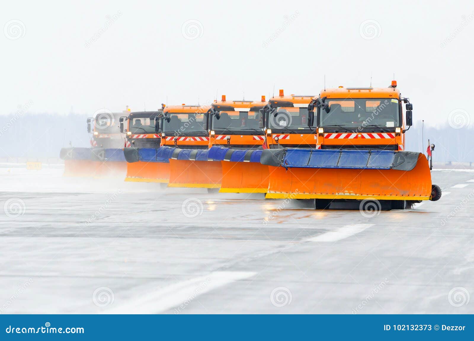 Snowplows in the Work on the Runway at the Airport. Stock Image - Image ...