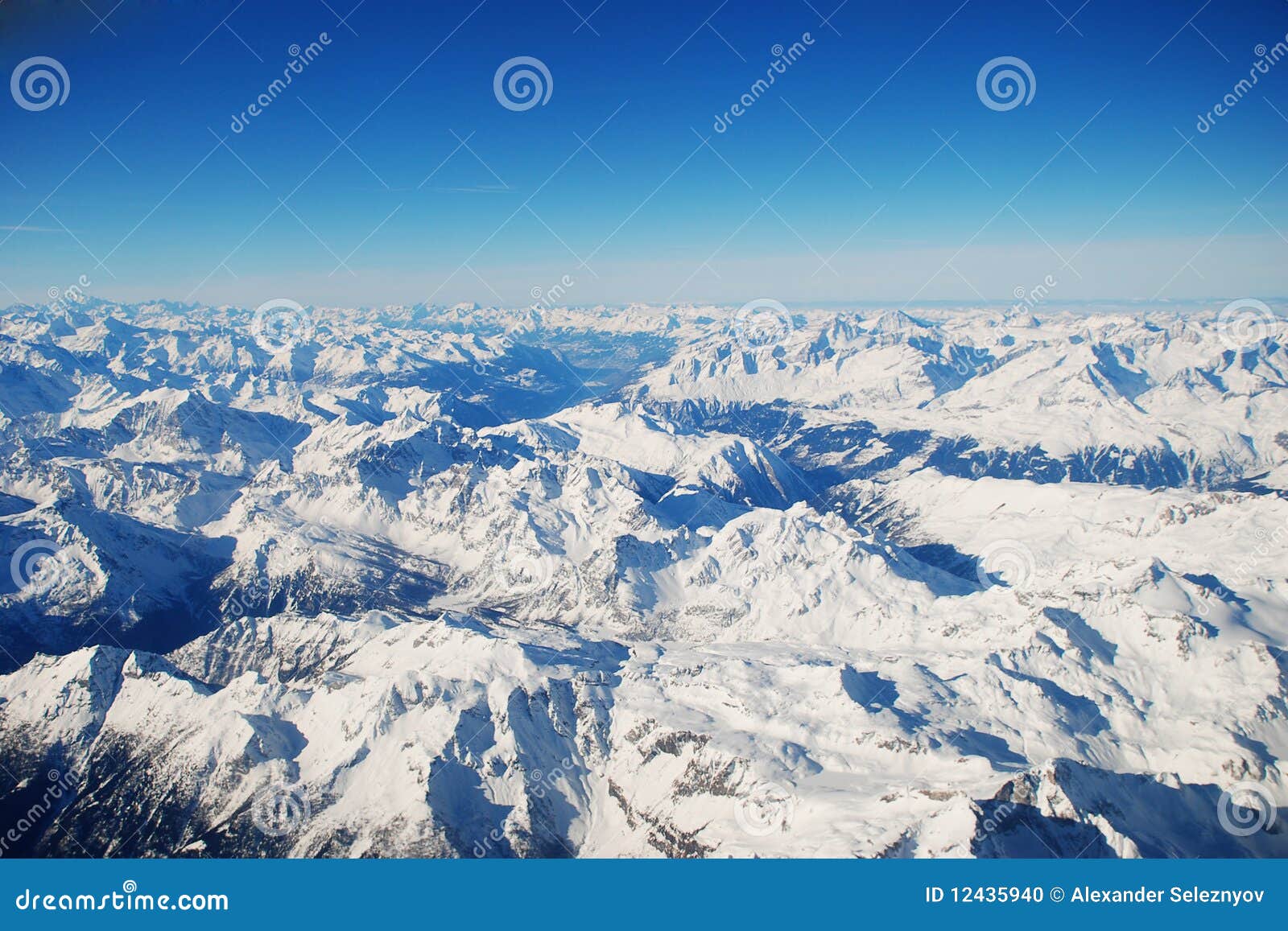 Snowy Alps in Switzerland stock photo. Image of athletic - 12435940