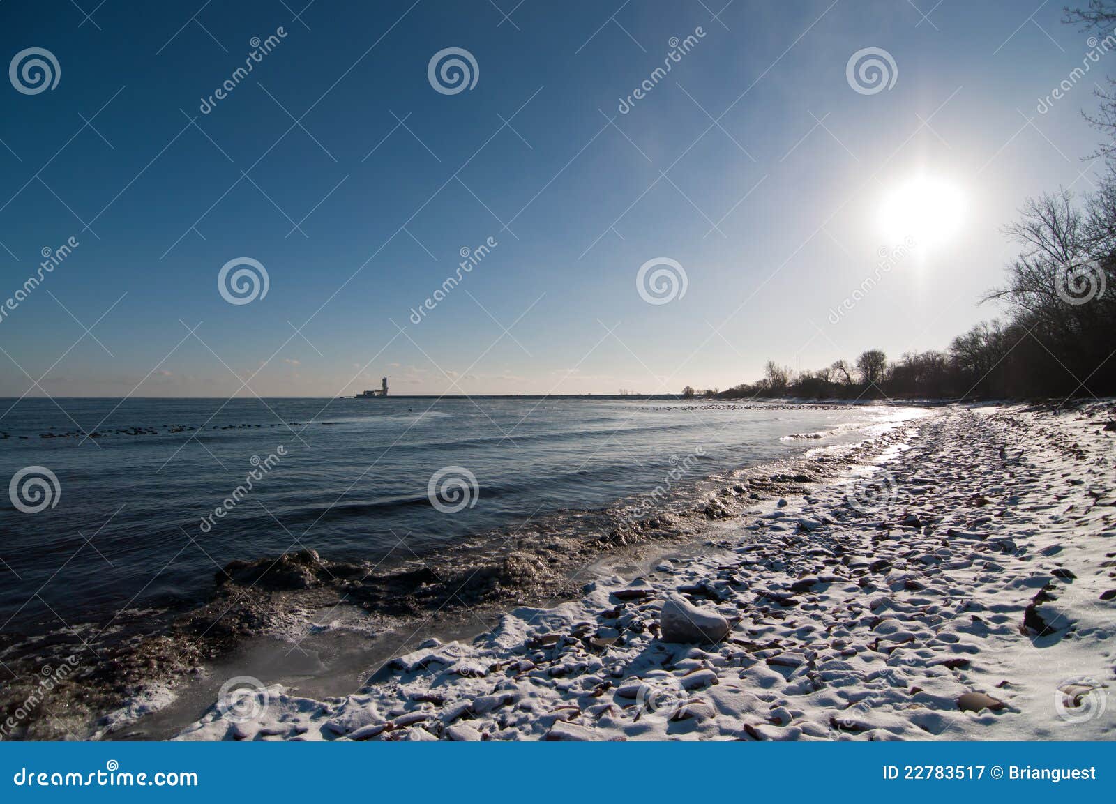 Snowy Beach in Winter stock image. Image of sunny, water - 22783517