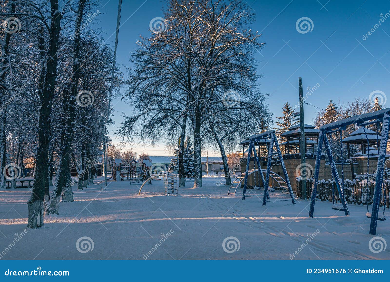 Snowy cold town stock photo. Image of road, yard, bush - 234951676