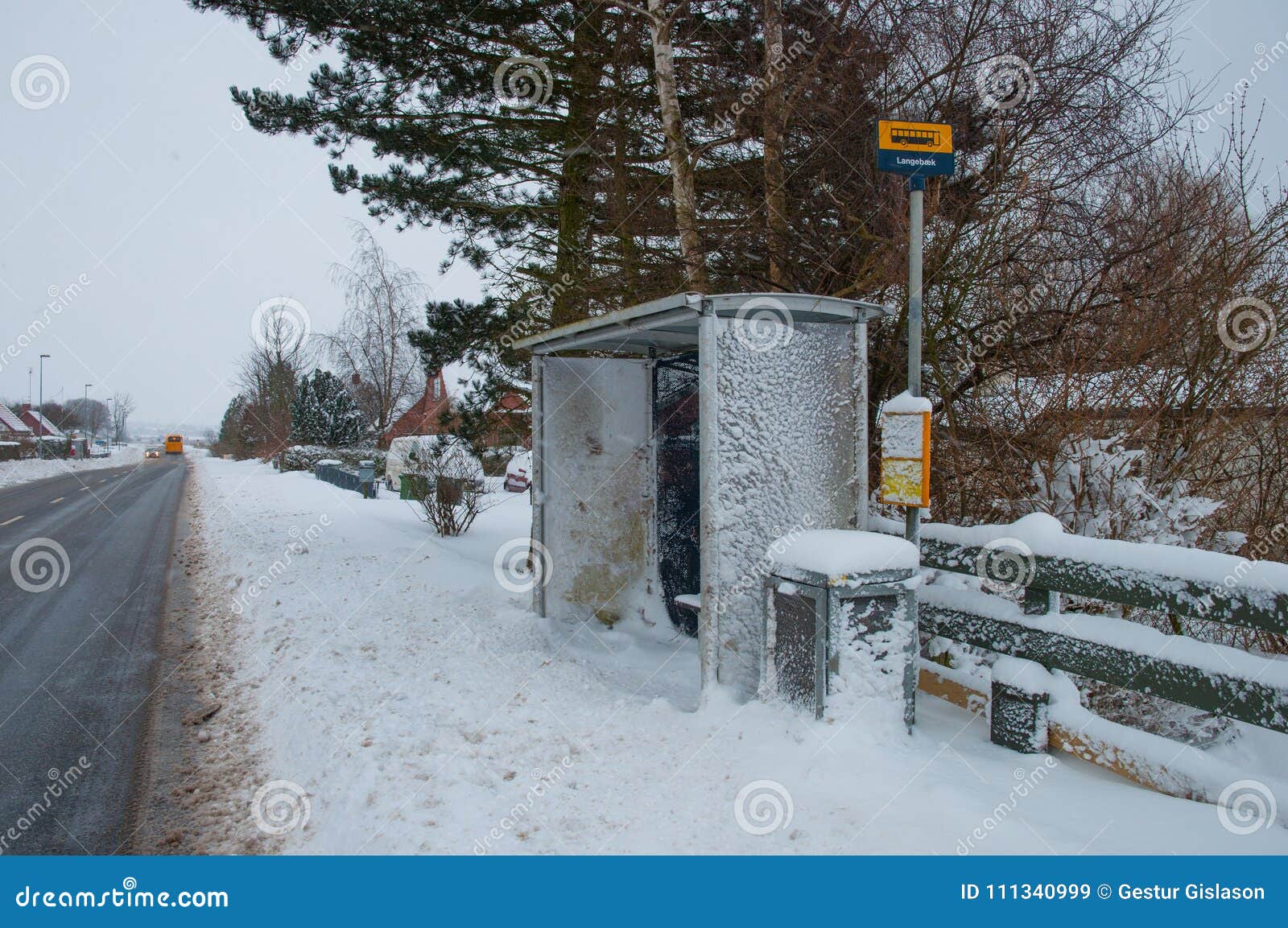 Bus stop on a snowy day stock image. Image of traditional - 111340999