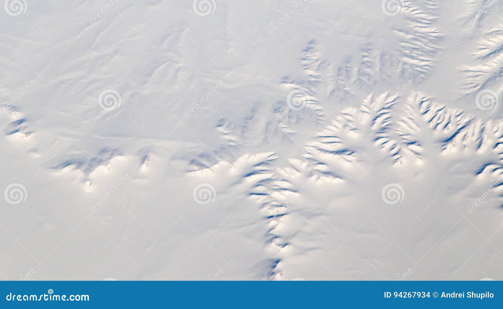 Snowy Land. View from the Airplane Stock Photo - Image of ridge ...