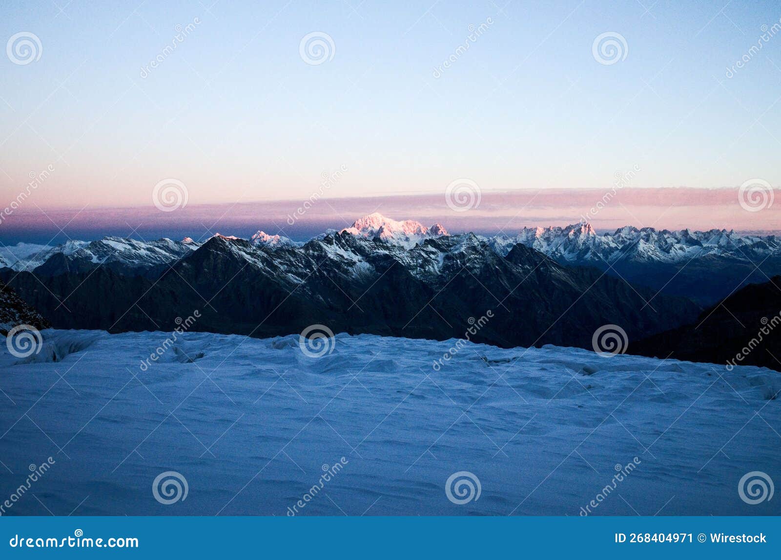 Snowy Landscape with Range of Mountains Stretching the Across Horizon ...