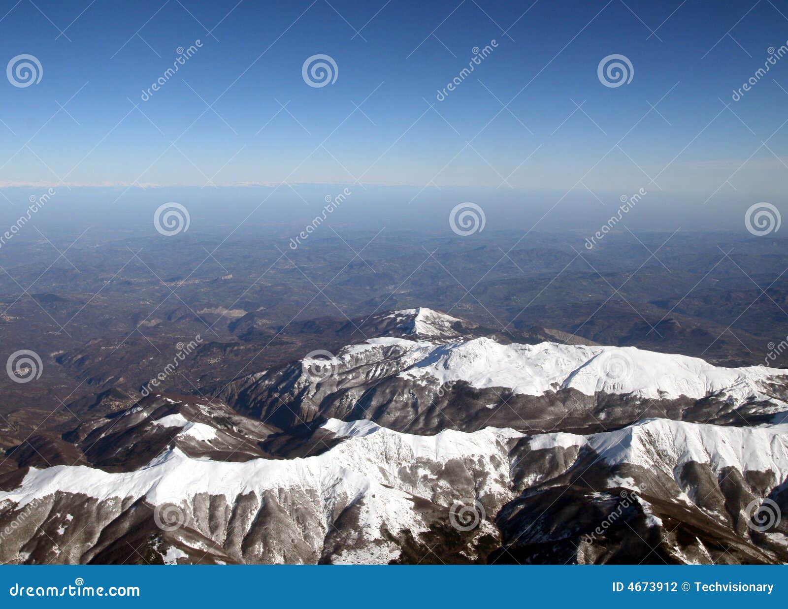 Snowy mountain tops stock photo. Image of scenic, peaks - 4673912