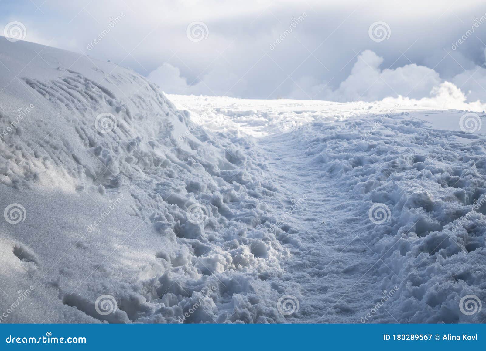 Snowy Path with Shoeprints, Path in Snow with Clouds on the Background ...