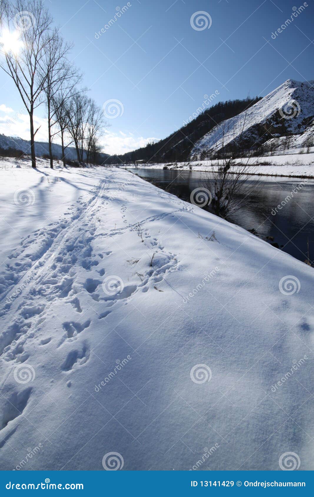 Snowy river bank stock image. Image of nature, winter - 13141429