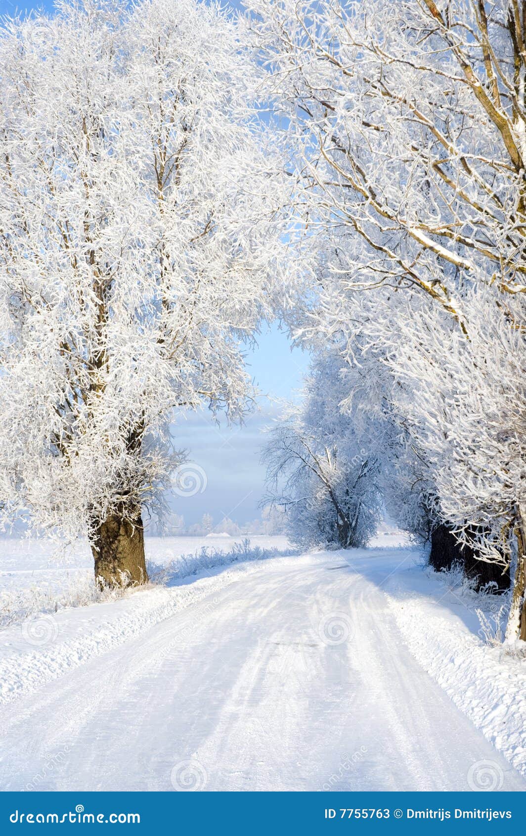 Snowy Road With Wind Turbines And Street Lamps Powered By Solar Panels ...