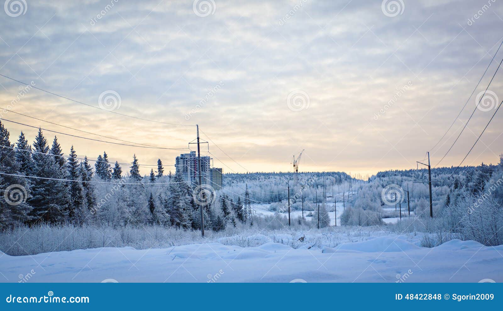 Snowy Road, Forest and Construction Site on Winter Landscape Stock ...