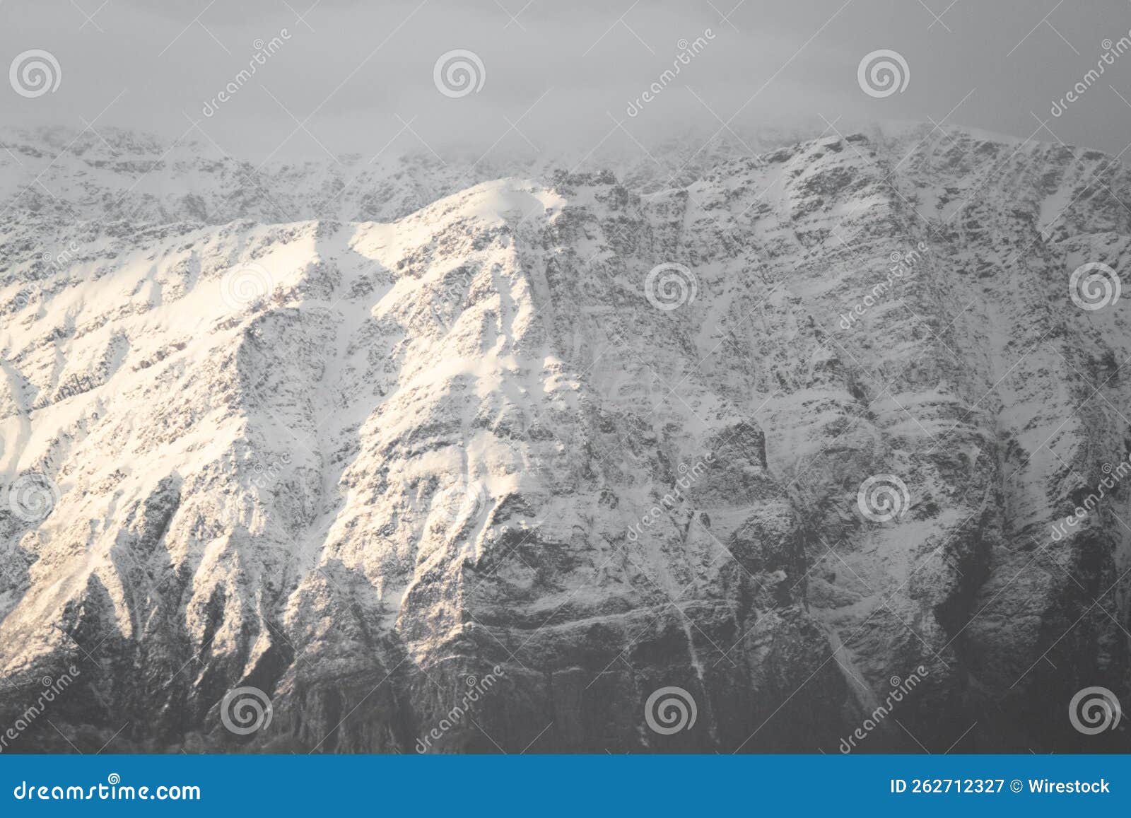 Snowy rocky mountain peak stock image. Image of cold - 262712327