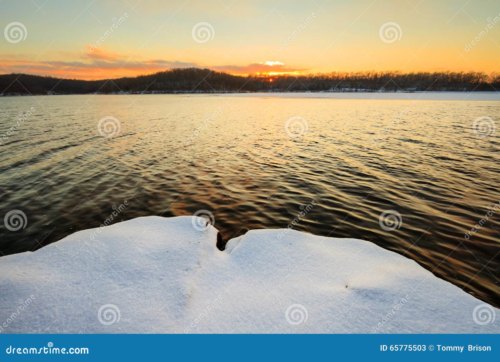 Snowy Sunset at the Lake stock image. Image of sunset - 65775503