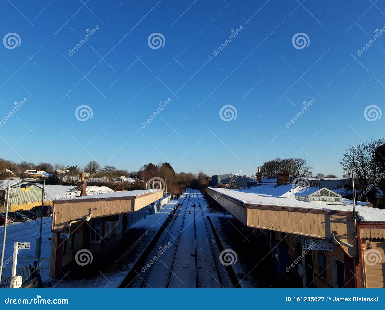 A Snowy Train Station with the Horizon Stock Image - Image of station ...