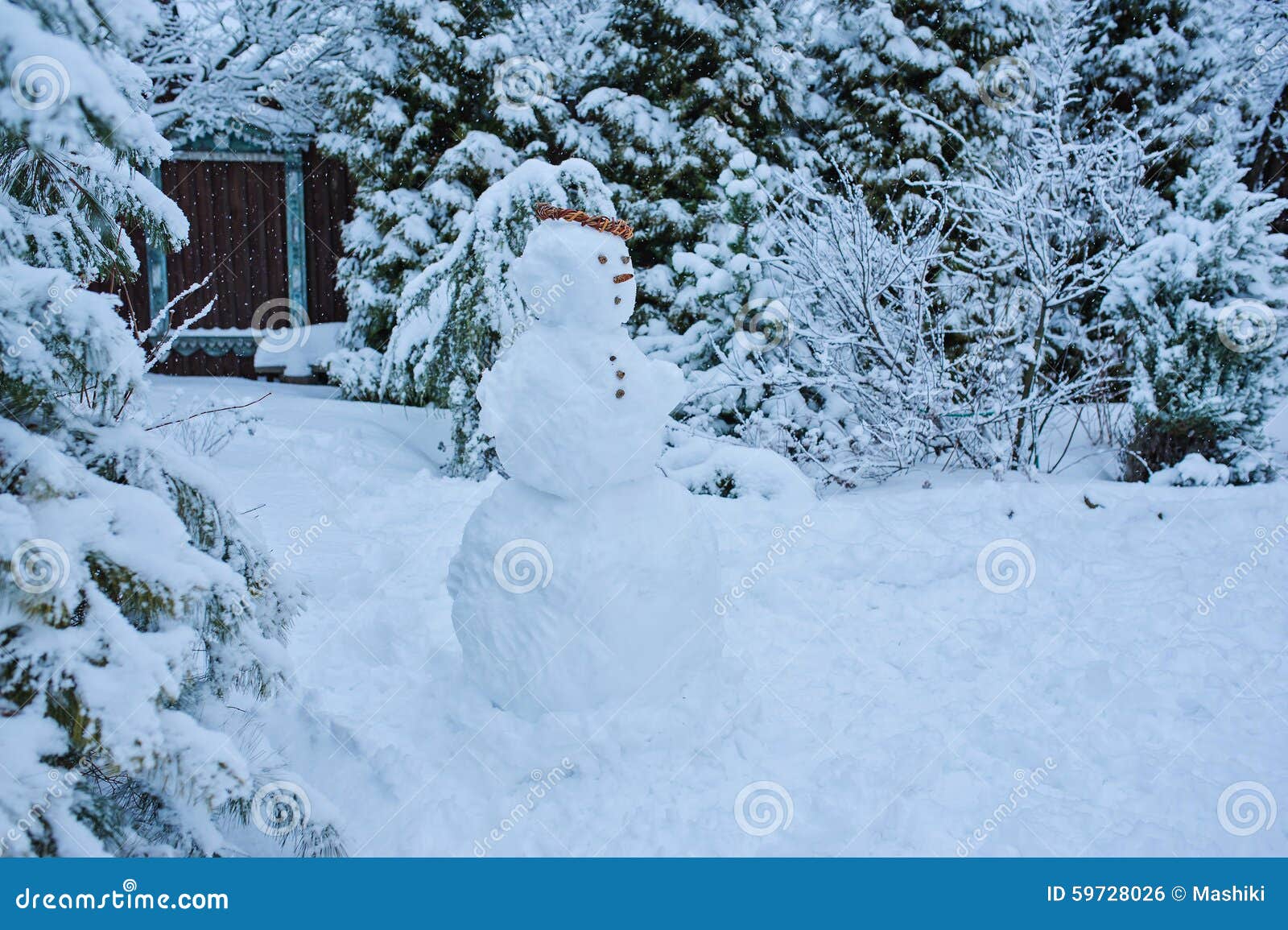Snowy Winter Garden View with Snowman Stock Photo - Image of winter ...