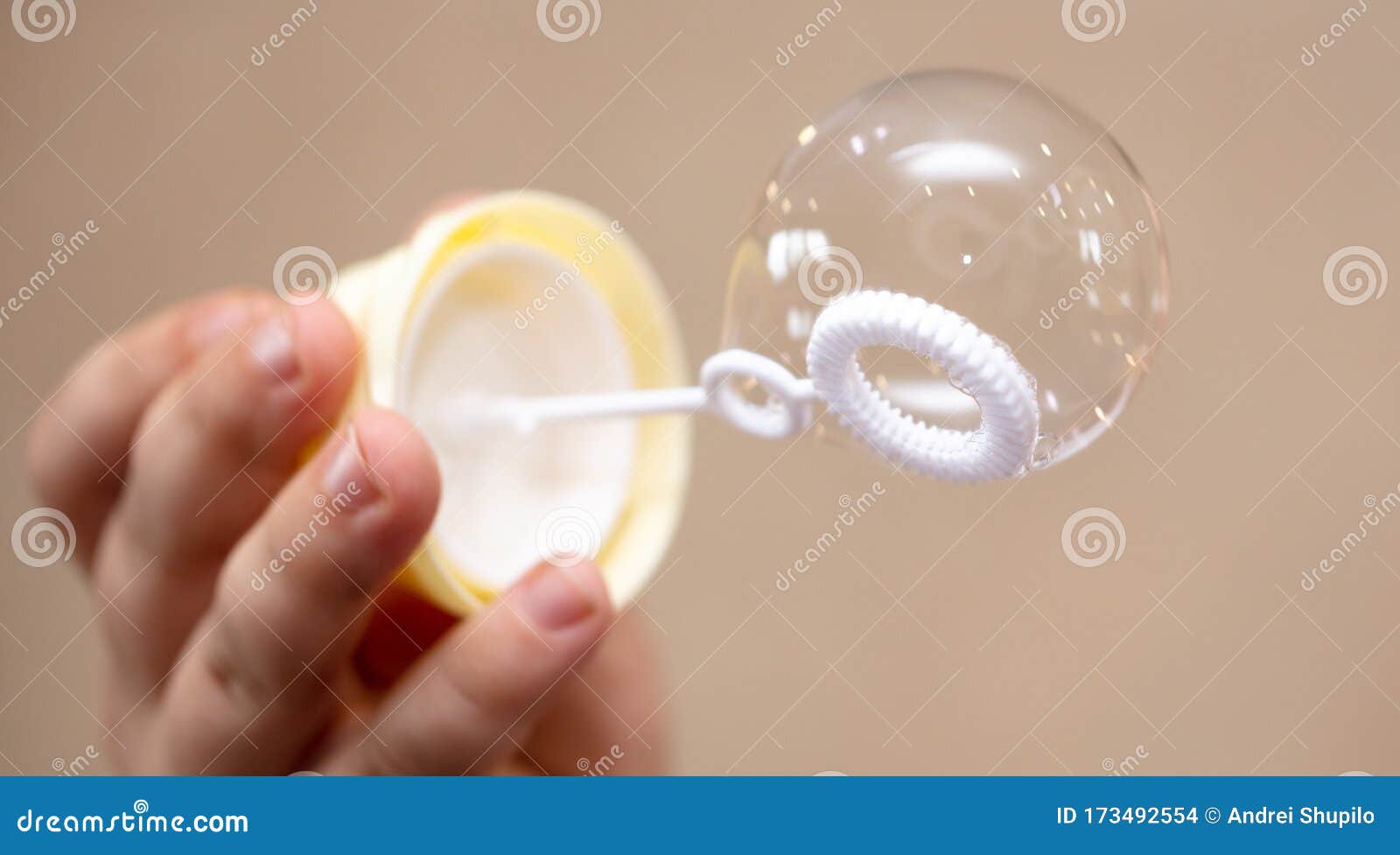 Soap bubble in the hand stock photo. Image of posing - 173492554