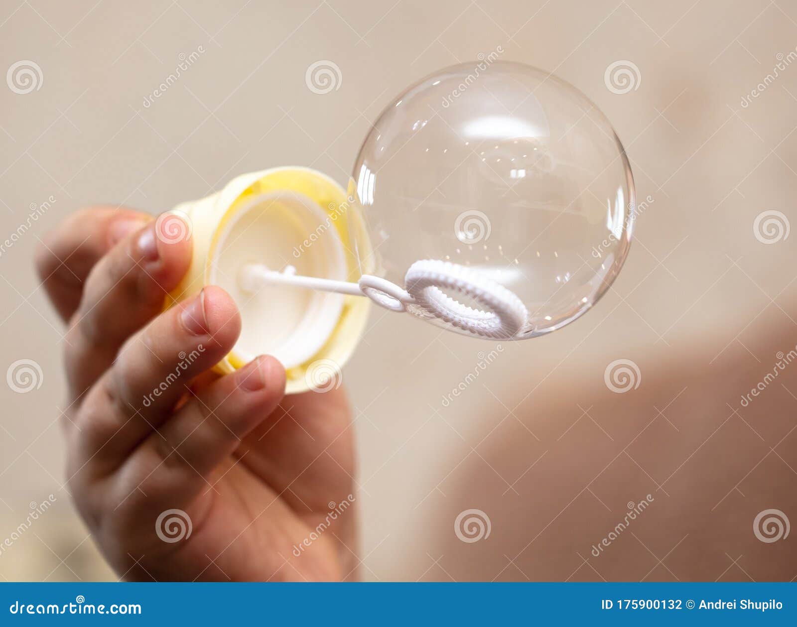 Soap bubble in the hand stock photo. Image of person - 175900132