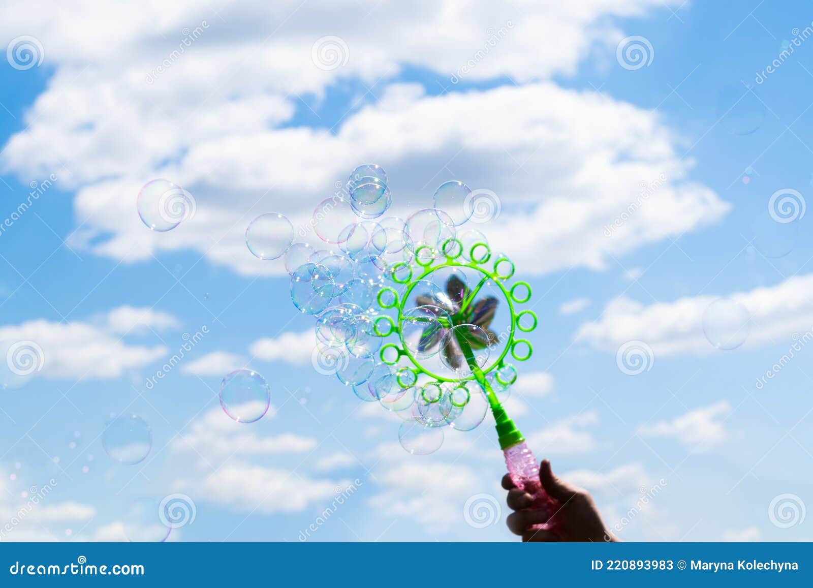 Soap Bubbles Toy with Propeller. Soap Bubble in Front of a Blue Sky in ...