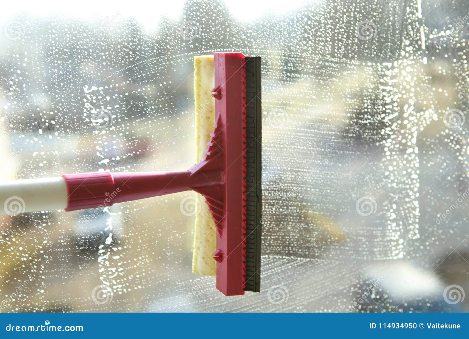 Soapy Window with a Squeegee Cleaning the Glass. Stock Photo - Image of ...