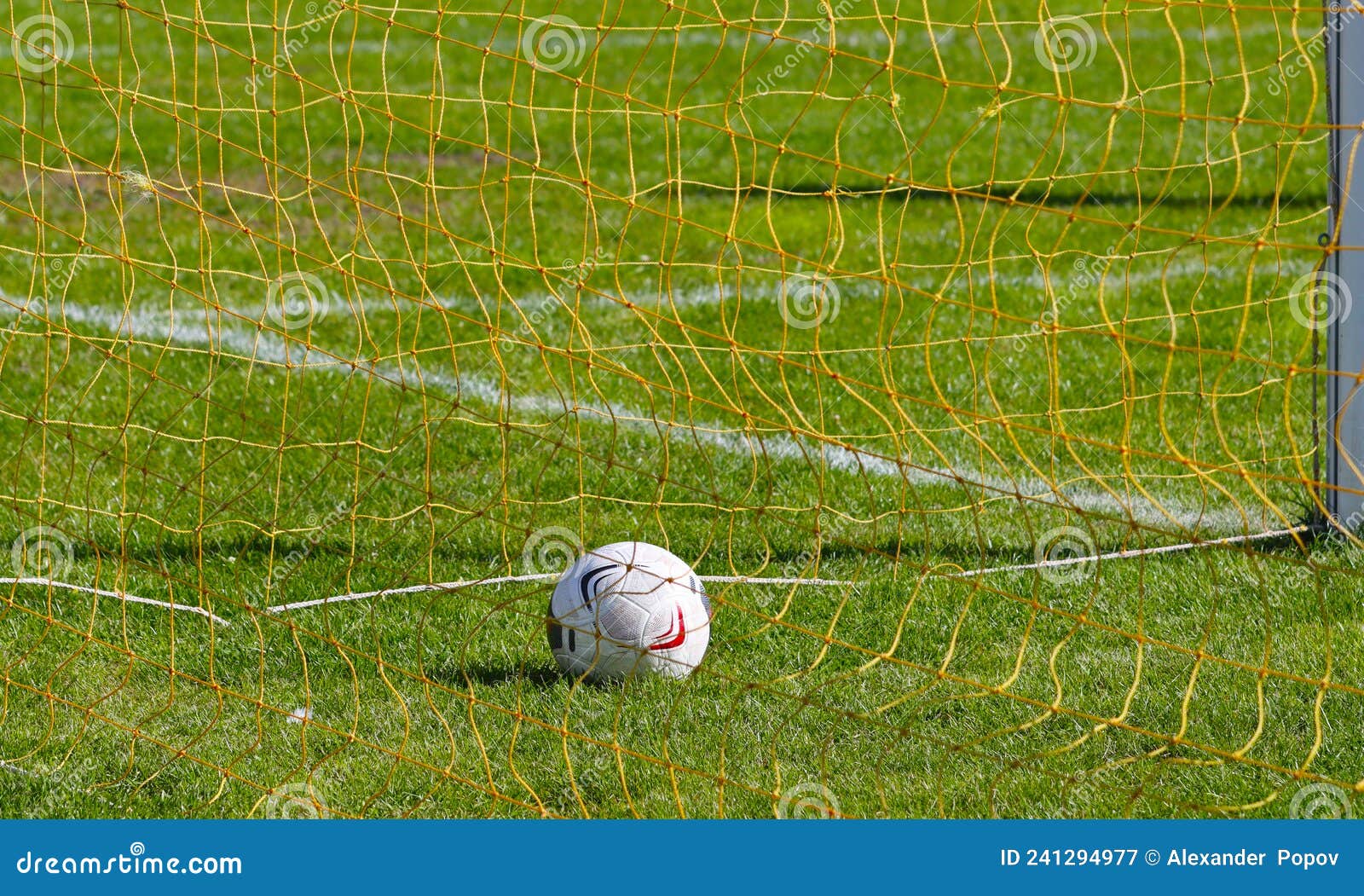 Soccer ball behind the net stock image. Image of light - 241294977