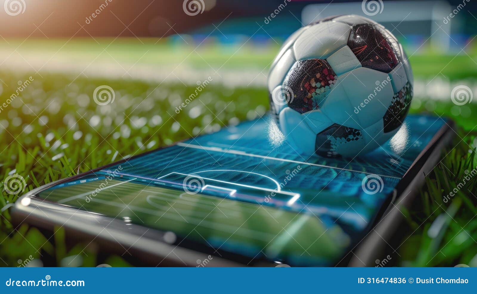 A Soccer Ball and a Cell Phone are on a Green Field Stock Photo - Image ...