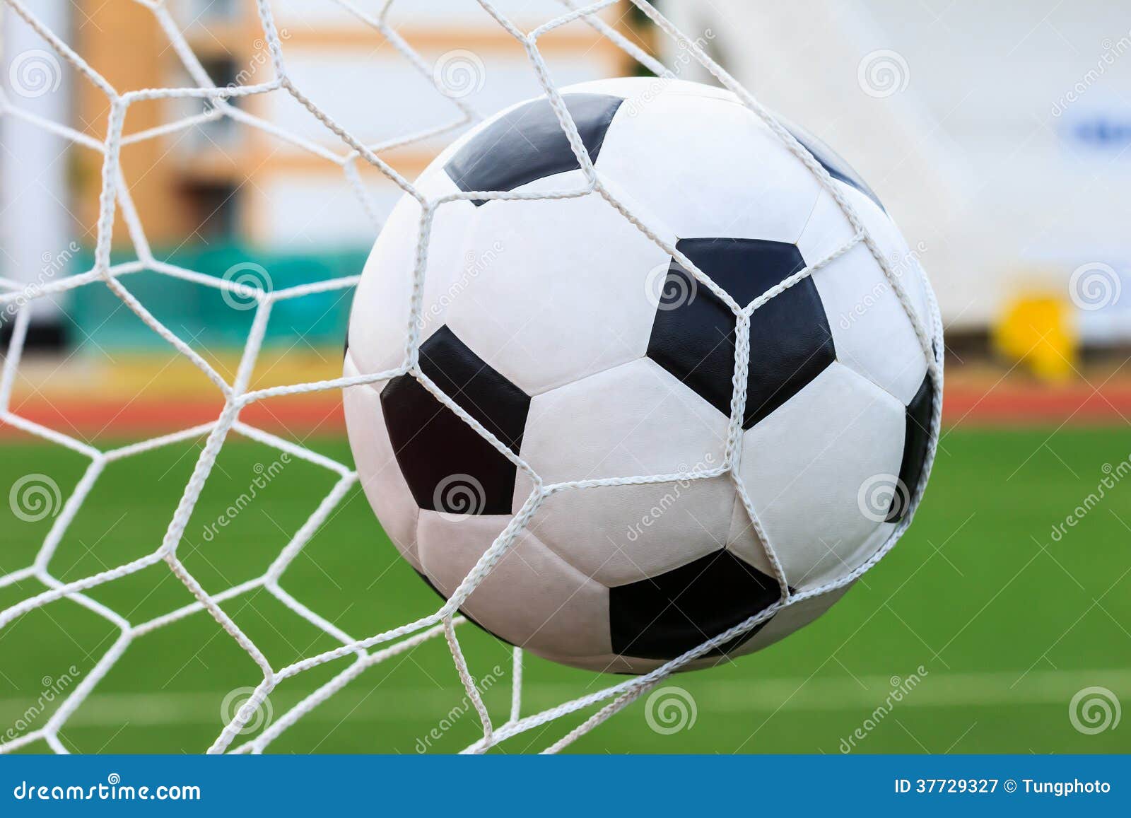 Soccer ball in goal net stock image. Image of ground - 37729327