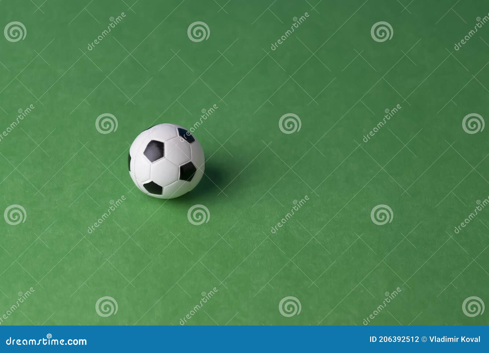 Soccer Ball on a Green Background.Background for Designers.Copy Space ...