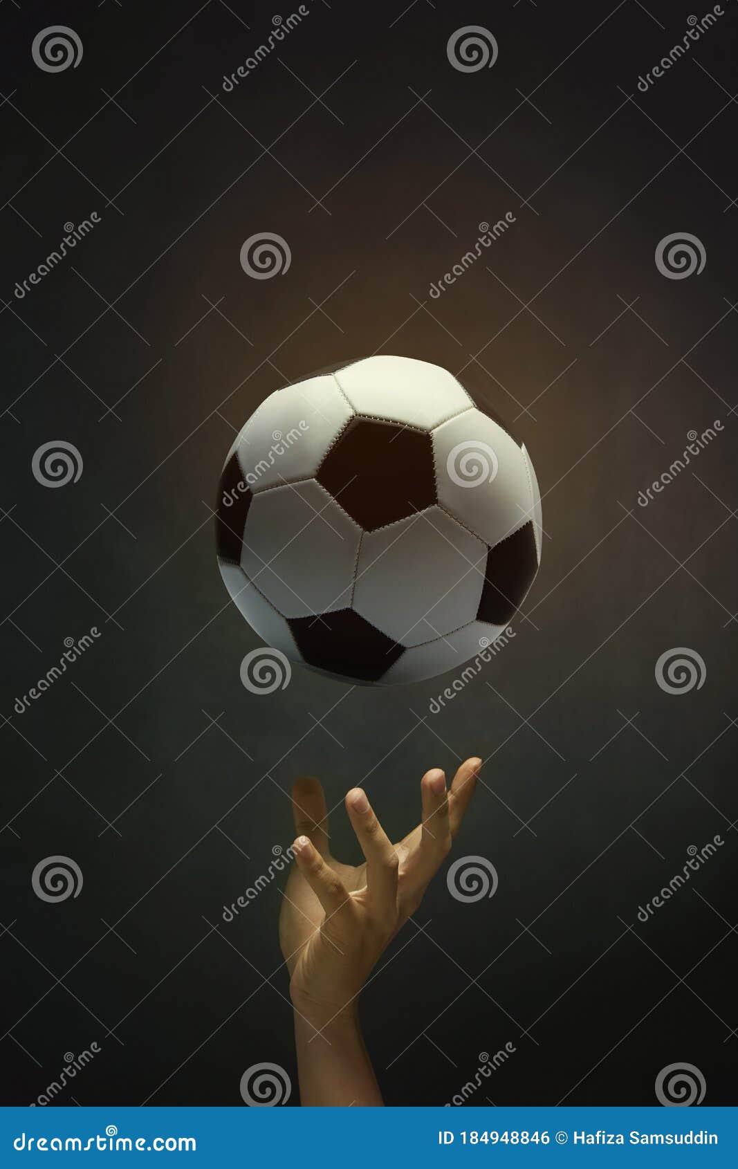 Soccer ball with hand stock photo. Image of graphic - 184948846