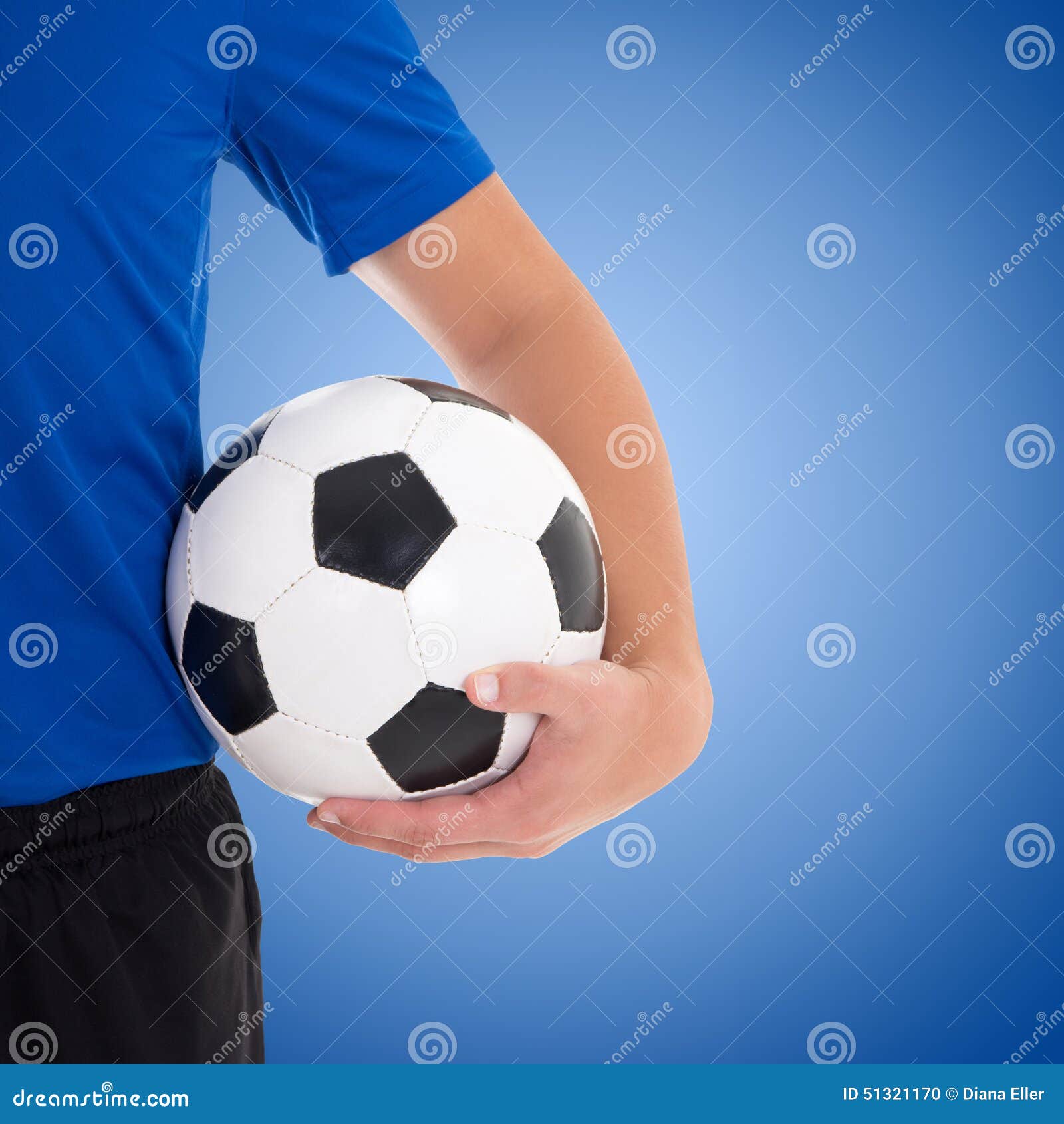 Soccer Ball in Player S Hand Over Blue Stock Photo - Image of happy ...