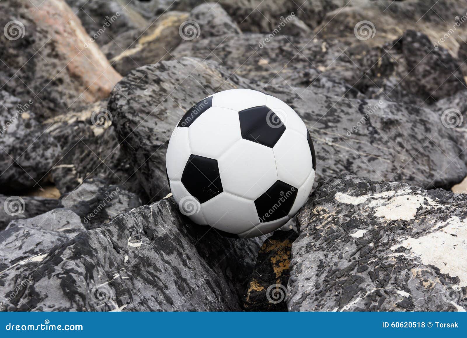 Soccer ball on rock stock photo. Image of soccer, sport - 60620518