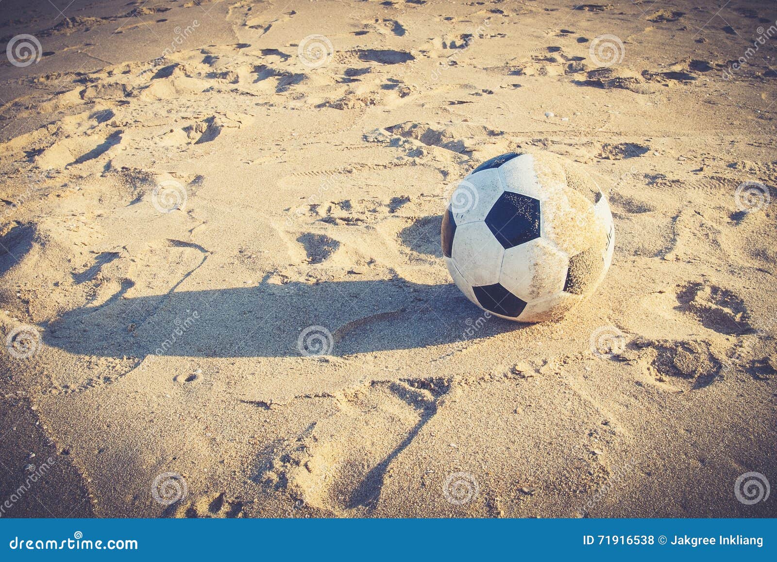 Soccer ball on sand stock photo. Image of tourist, background - 71916538