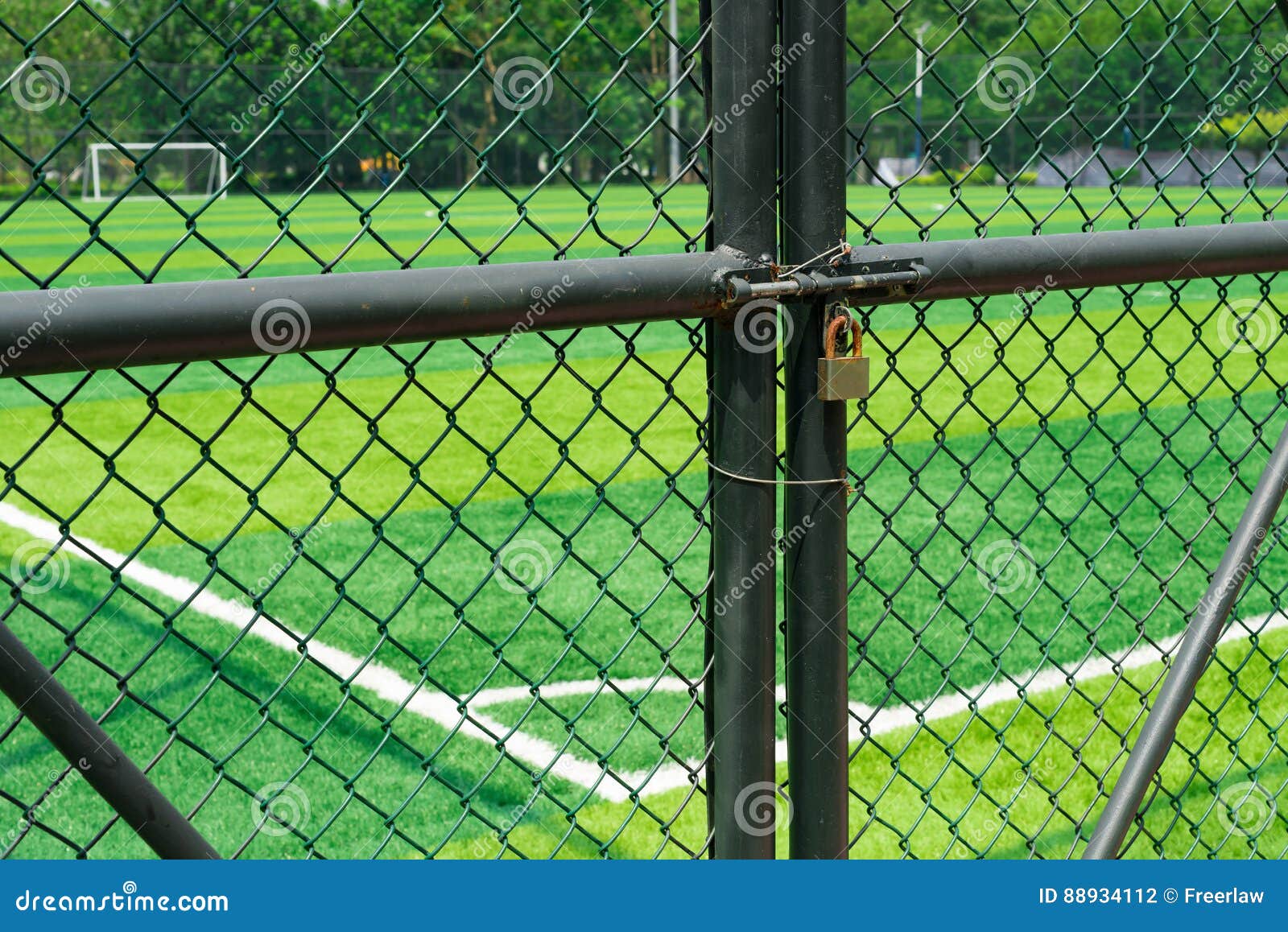 Soccer field being locked stock photo. Image of access - 88934112