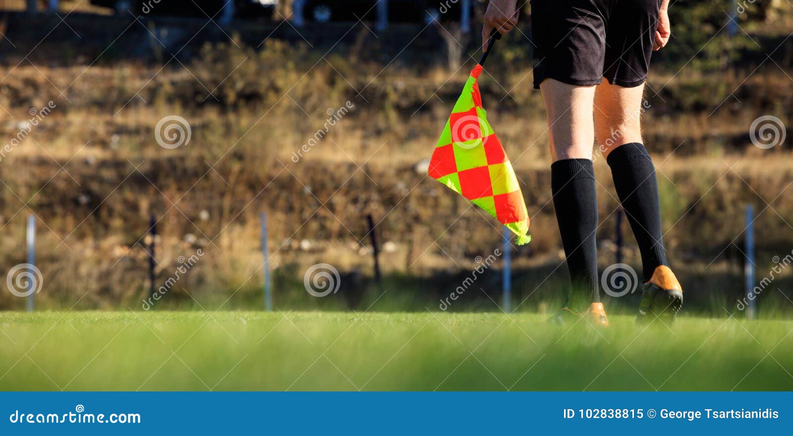 Soccer Assistant Referee on the Field Stock Image - Image of flag ...