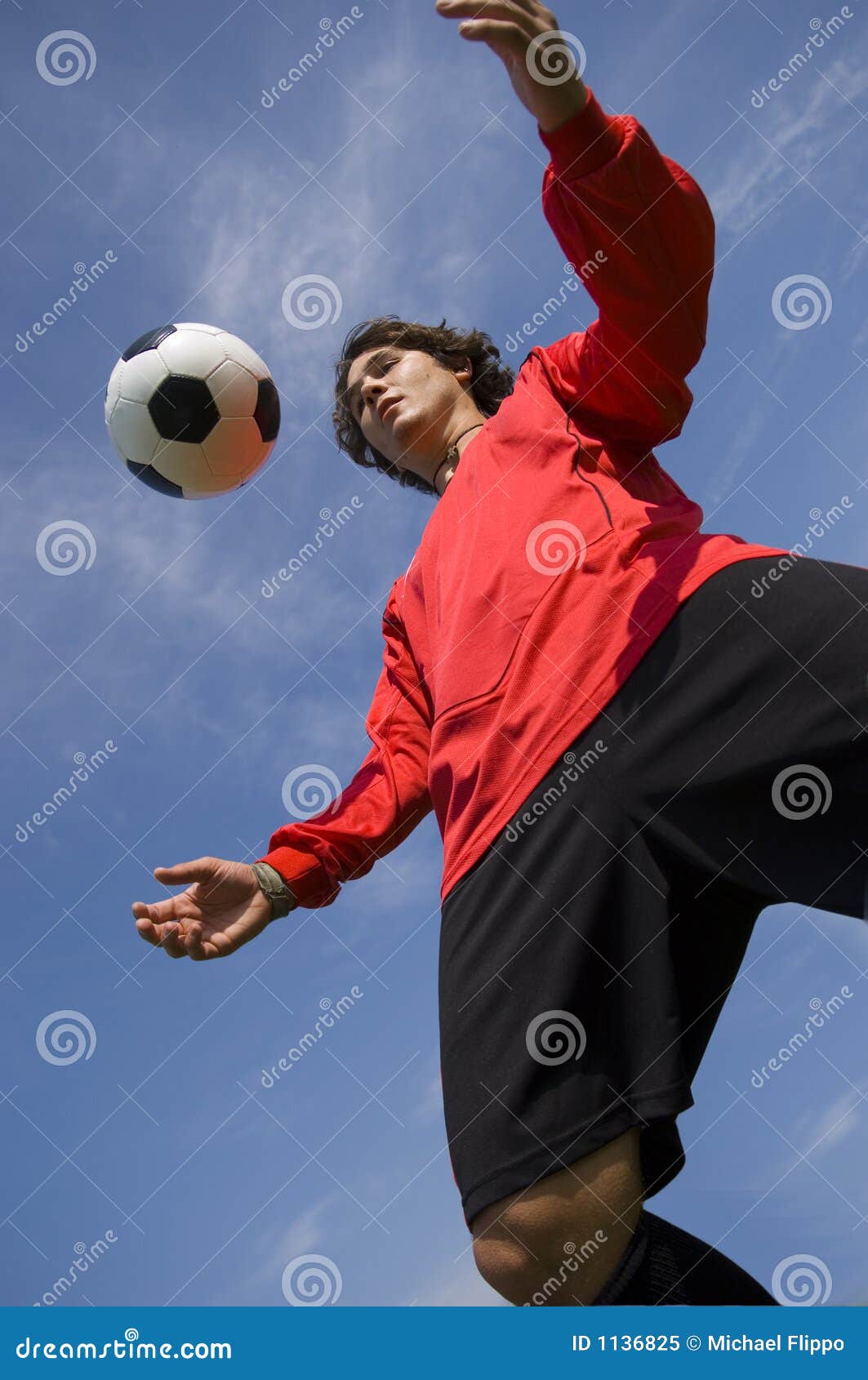 Soccer Football Player in Red Controlling Ball Stock Image - Image of ...